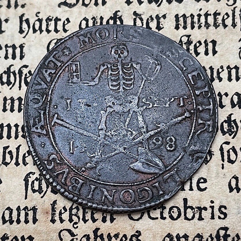 Top 10 Spooky Coins Throughout History: Witchcraft, Skulls, and UFOs